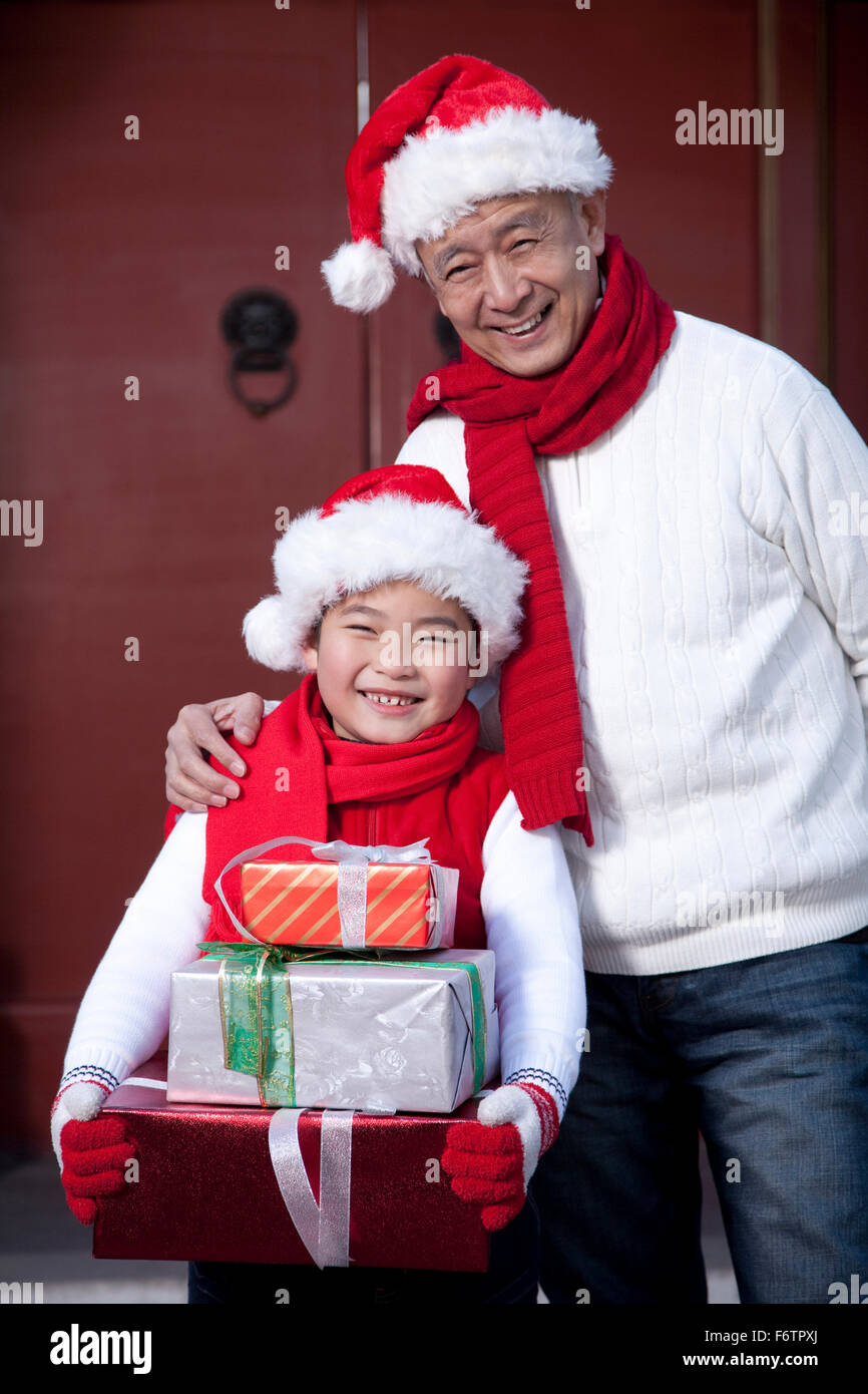 Portrait grandfather giving grandson hi-res stock photography and ...