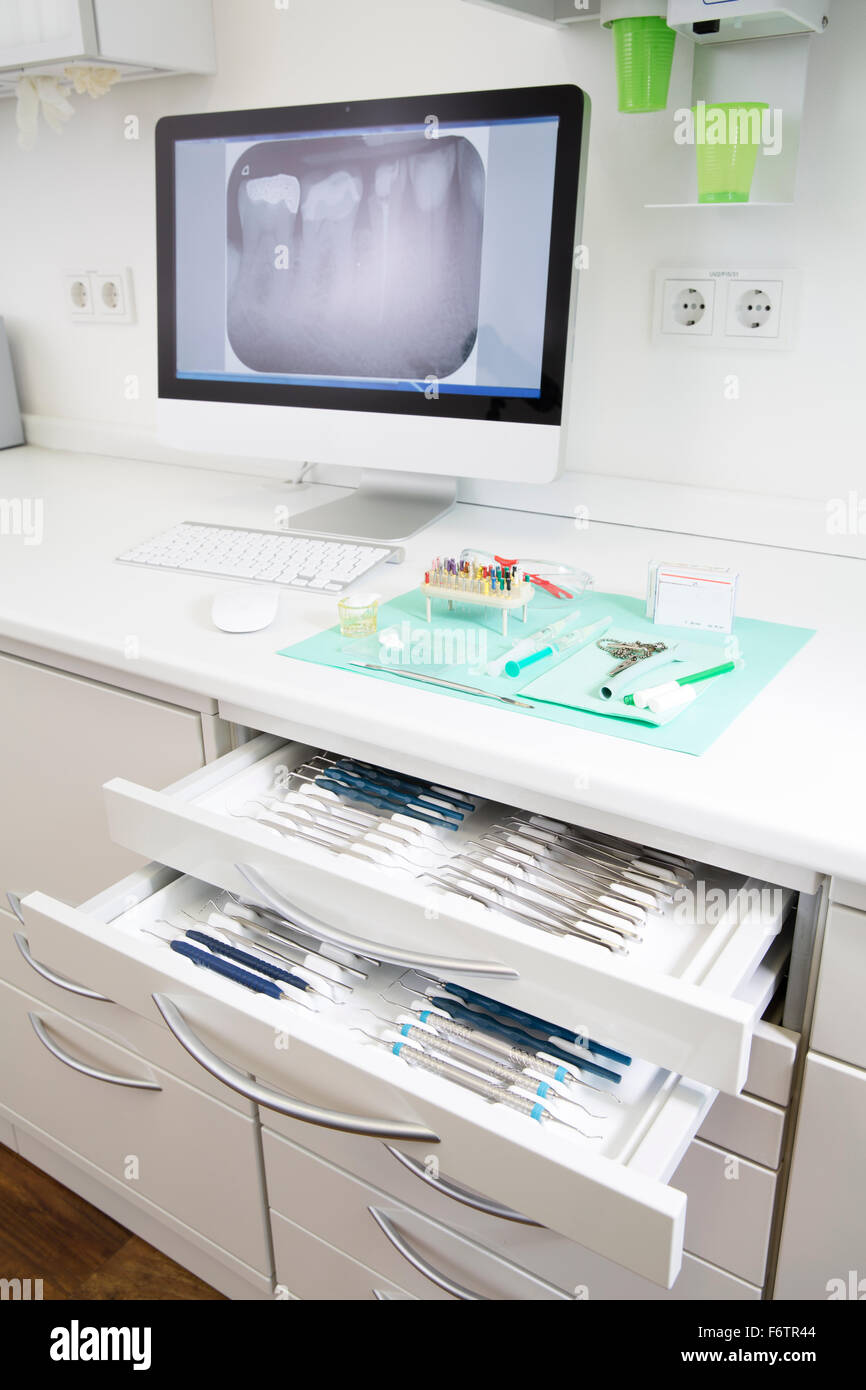 Drawer with dental instruments and x-ray image of teeth Stock Photo - Alamy