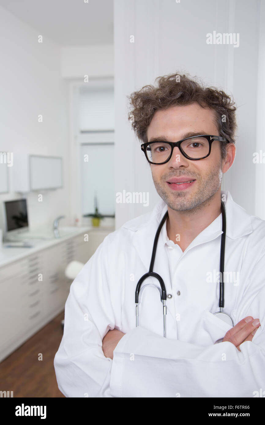 Portrait of smiling doctor at medical practice Stock Photo - Alamy