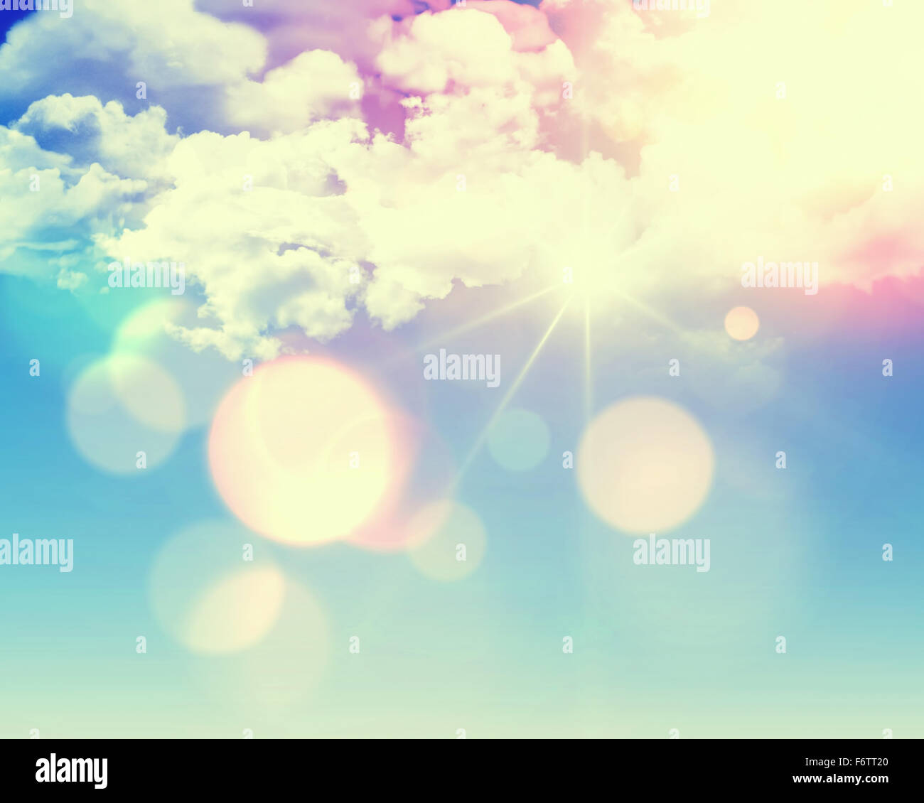Sunny blue sky background with fluffy white clouds and retro effect ...
