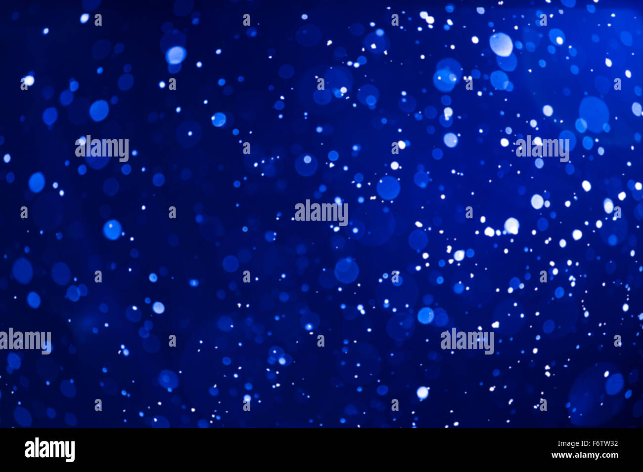 Falling snow background Stock Photo - Alamy