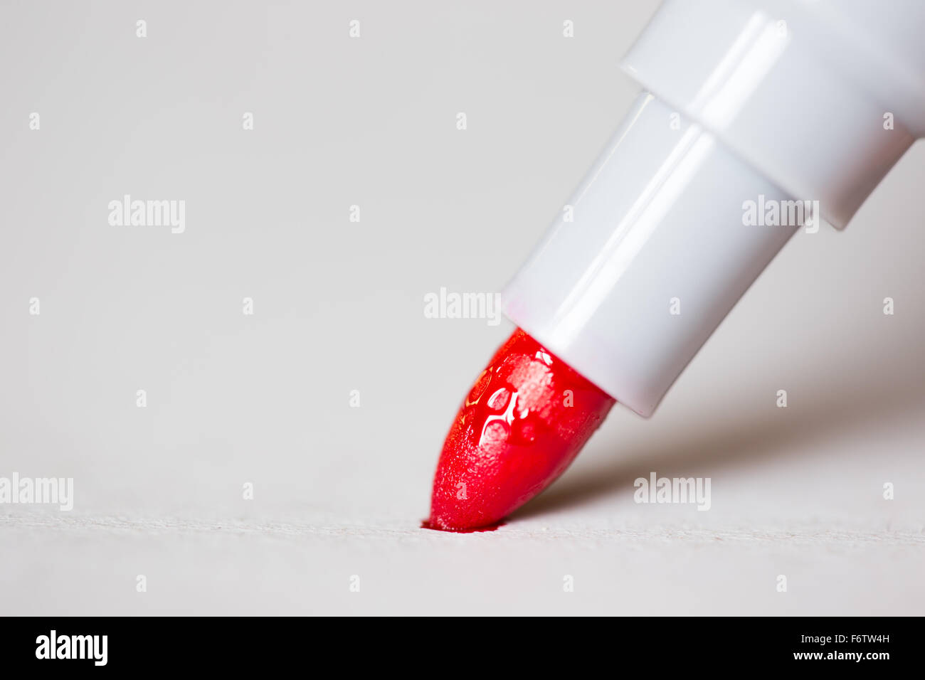 Red marker draws a line close up photo Stock Photo - Alamy
