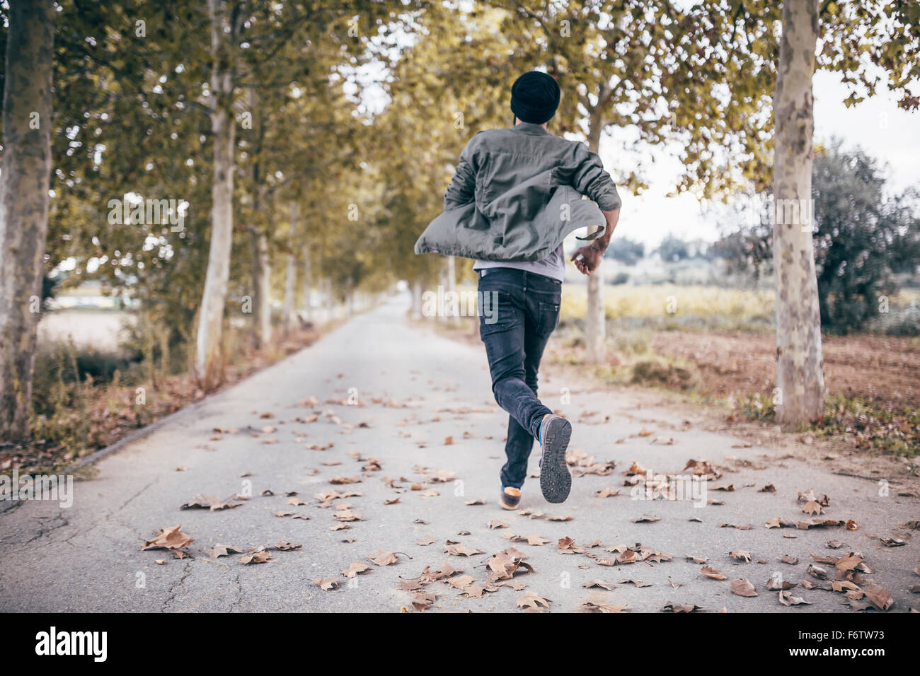 Man running back view one hi-res stock photography and images - Alamy