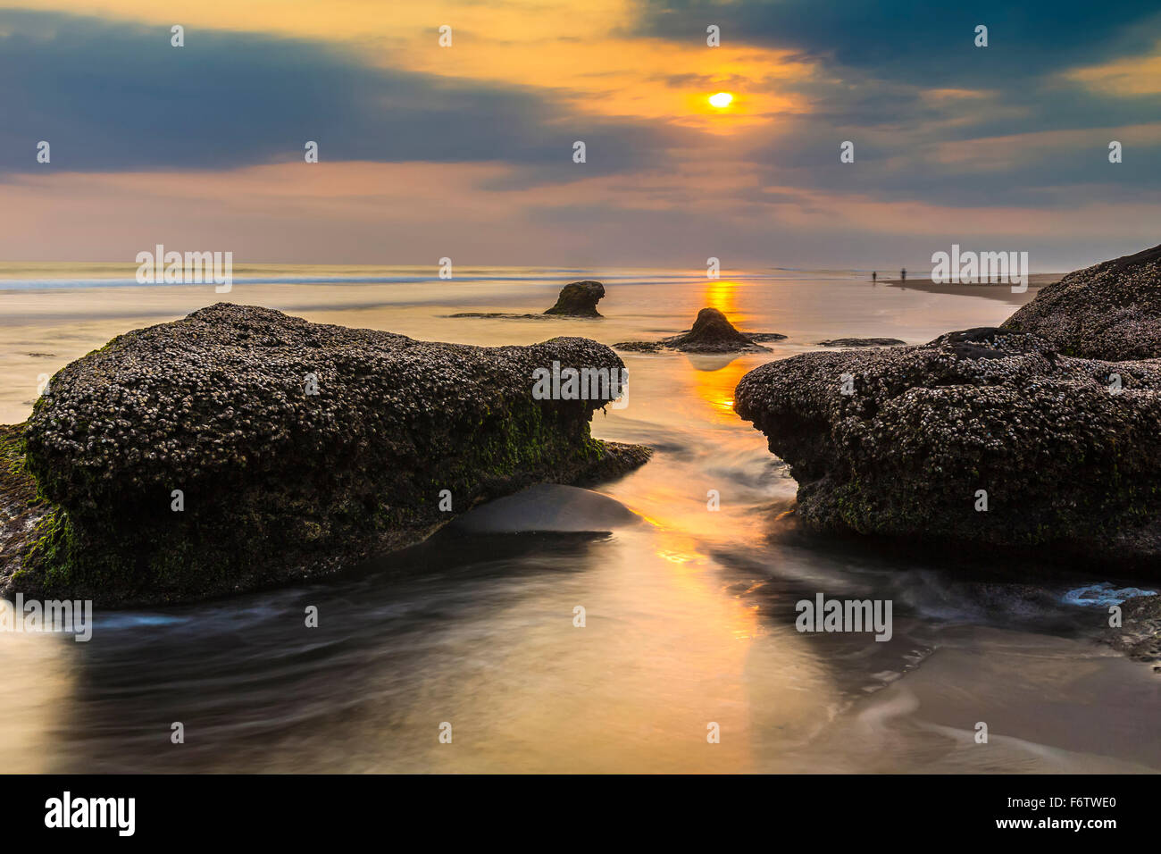 Indonesia, Bali, coast at sunset Stock Photo - Alamy