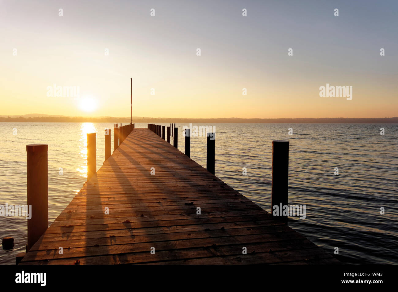 Germany, Bavaria, Starnberg lake, boat bridge at sunset Stock Photo - Alamy