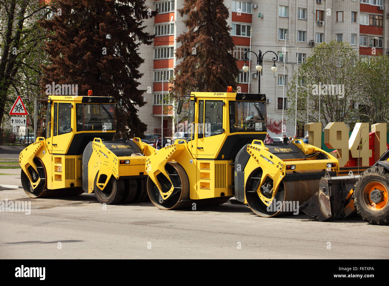 Two heavy asphalt roller in the street Stock Photo - Alamy