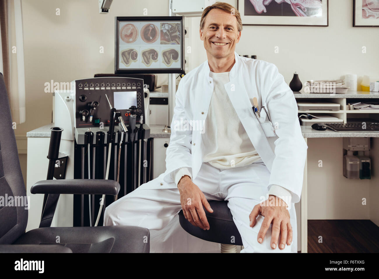 Ent doctor sitting in his practice hi-res stock photography and images ...