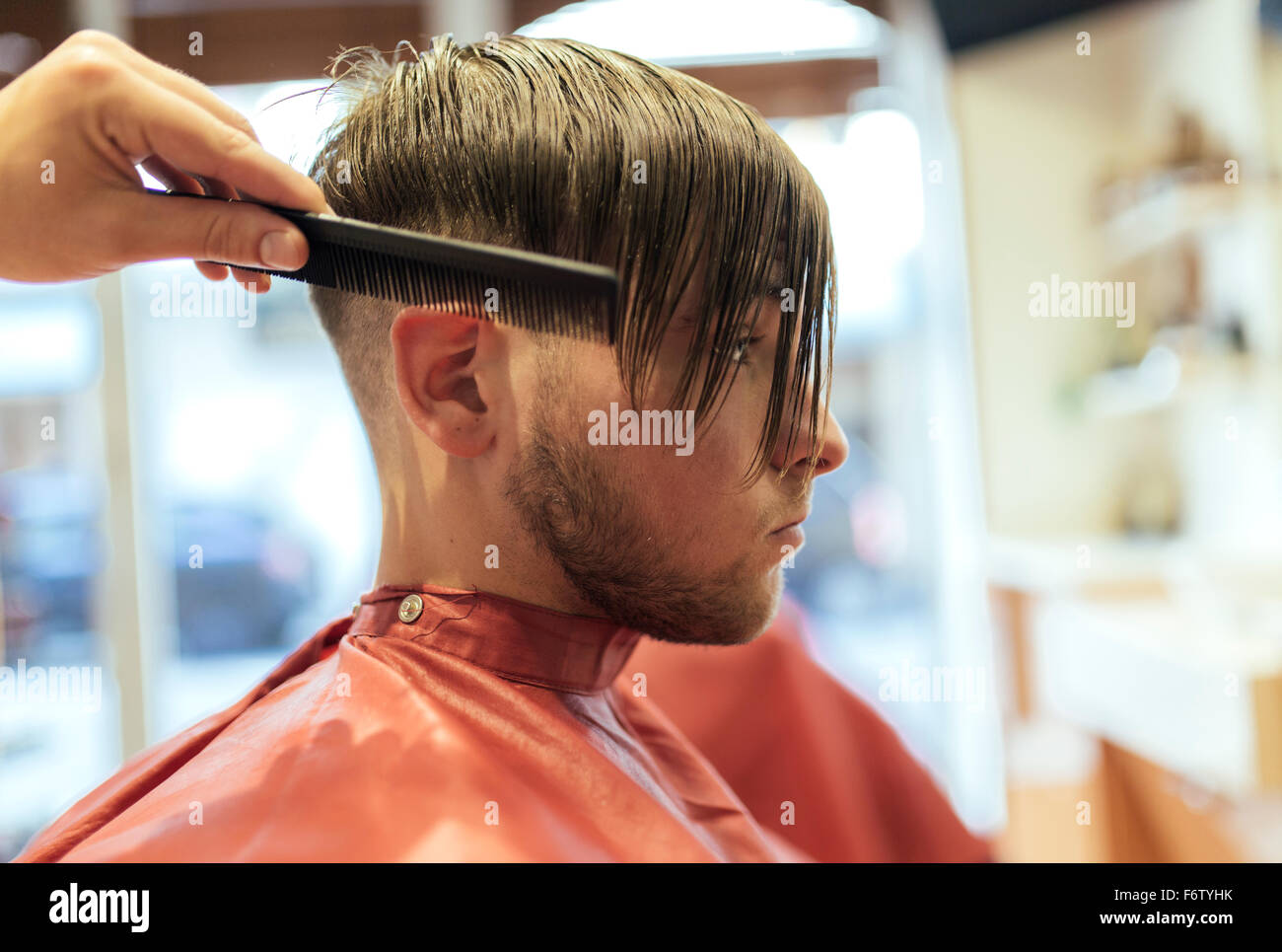 Man combing beard close up hi-res stock photography and images - Alamy