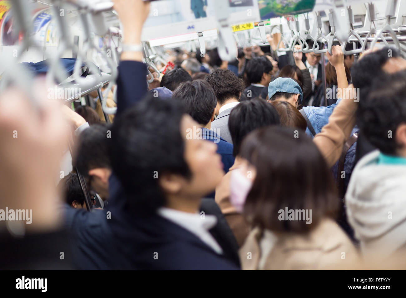 Passengers traveling by Tokyo metro Stock Photo - Alamy