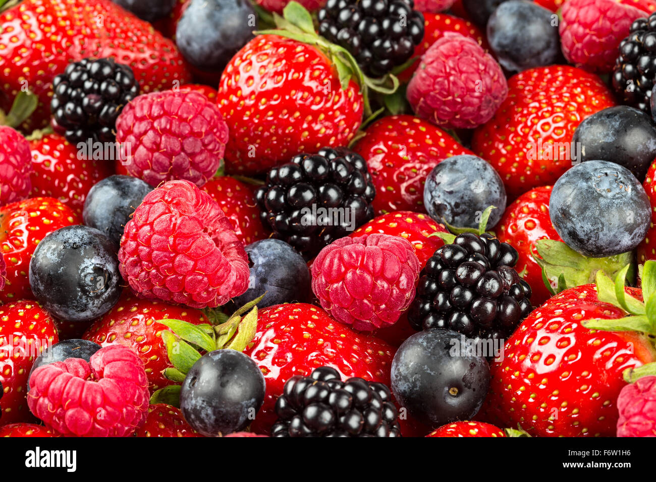 a variation of berry fruits Stock Photo - Alamy