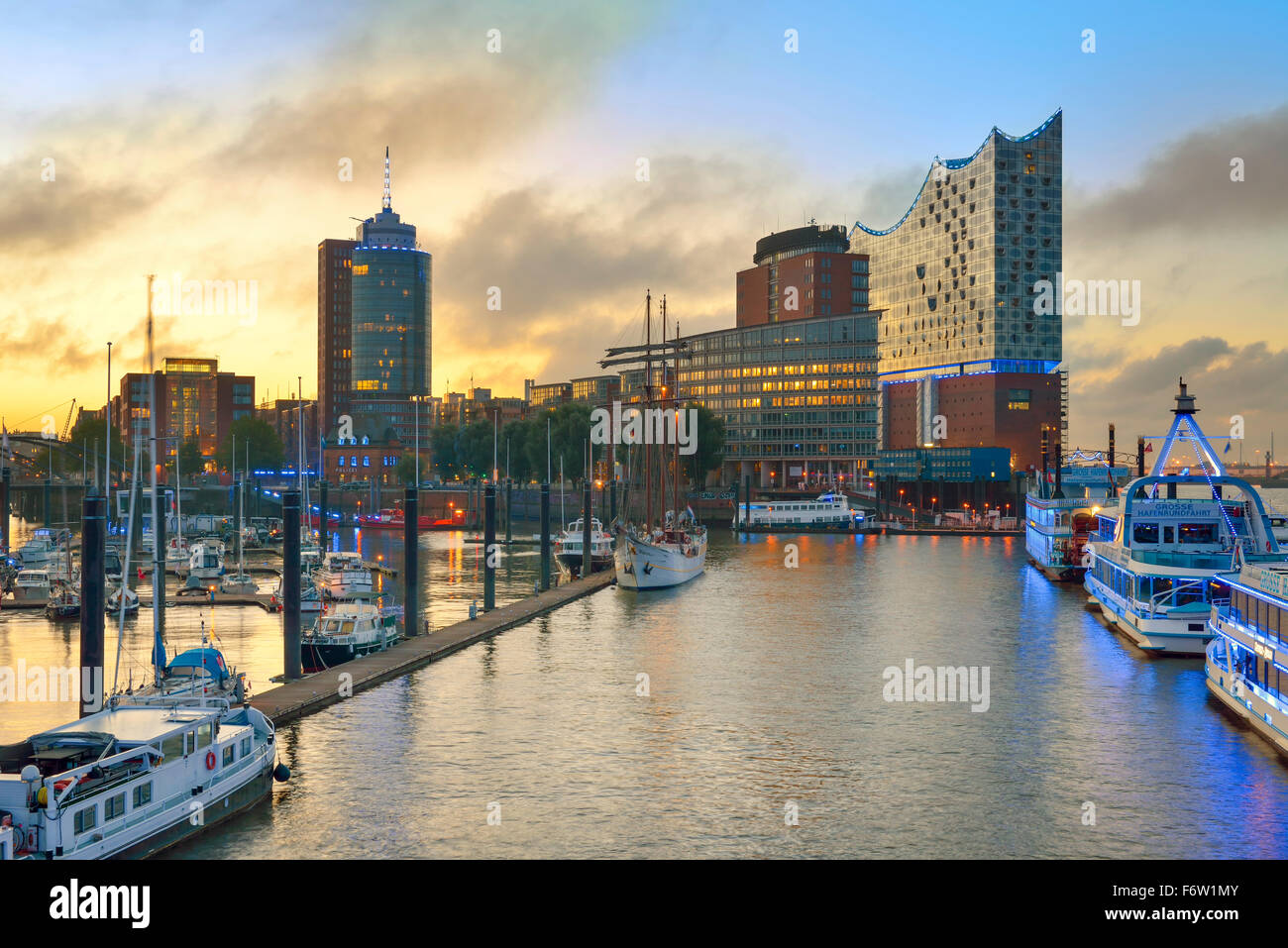 Germany, Harbour at sunrise, with Elbphilharmonie and Hanseatic Trade ...
