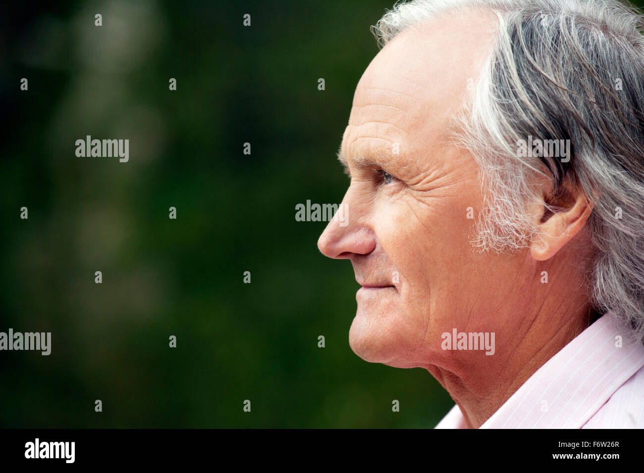 Profile of smiling senior Stock Photo - Alamy