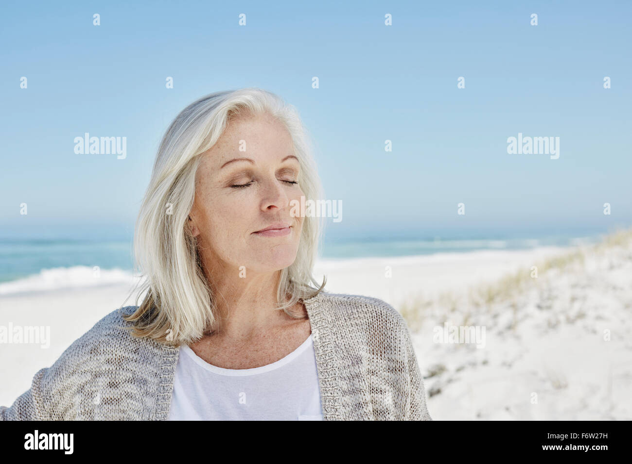 Best ager woman at the beach Stock Photo - Alamy