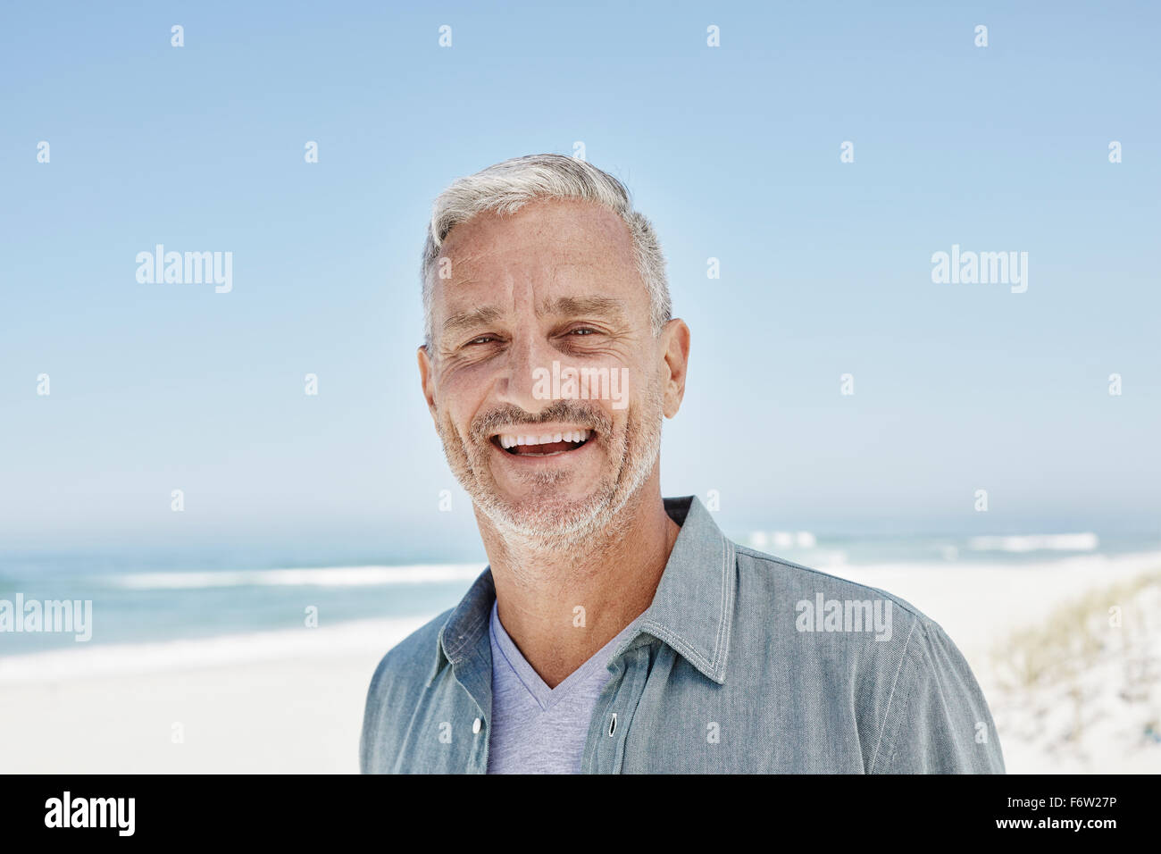 Best ager at the beach Stock Photo - Alamy