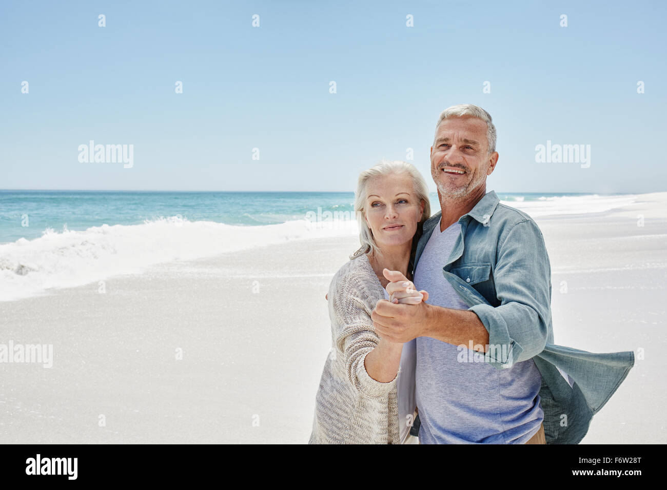 Best agers at the beach Stock Photo - Alamy