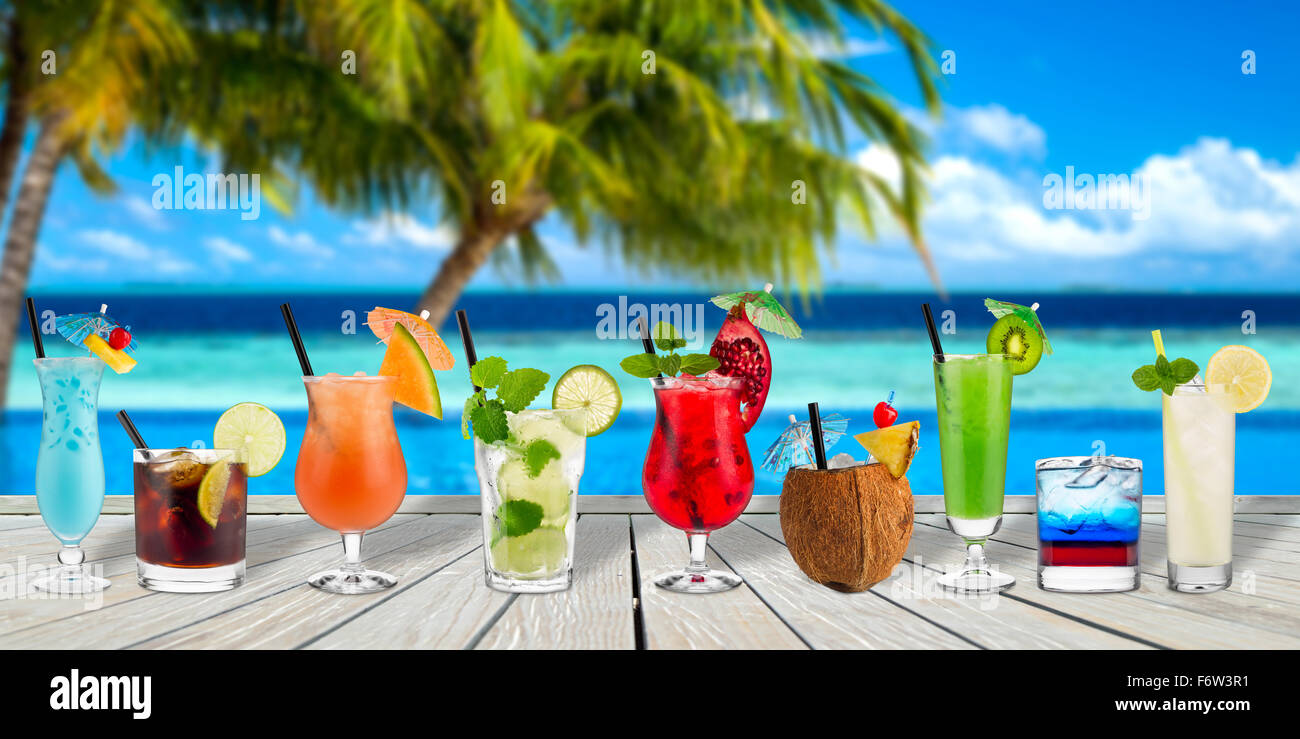 colorful cocktails in front of infinity pool Stock Photo - Alamy