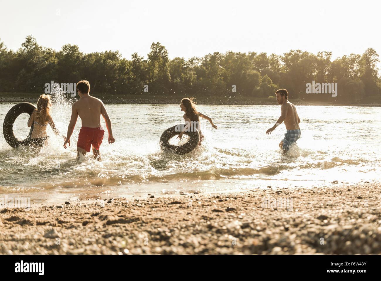 Man floating in an inner tube hi-res stock photography and images - Alamy