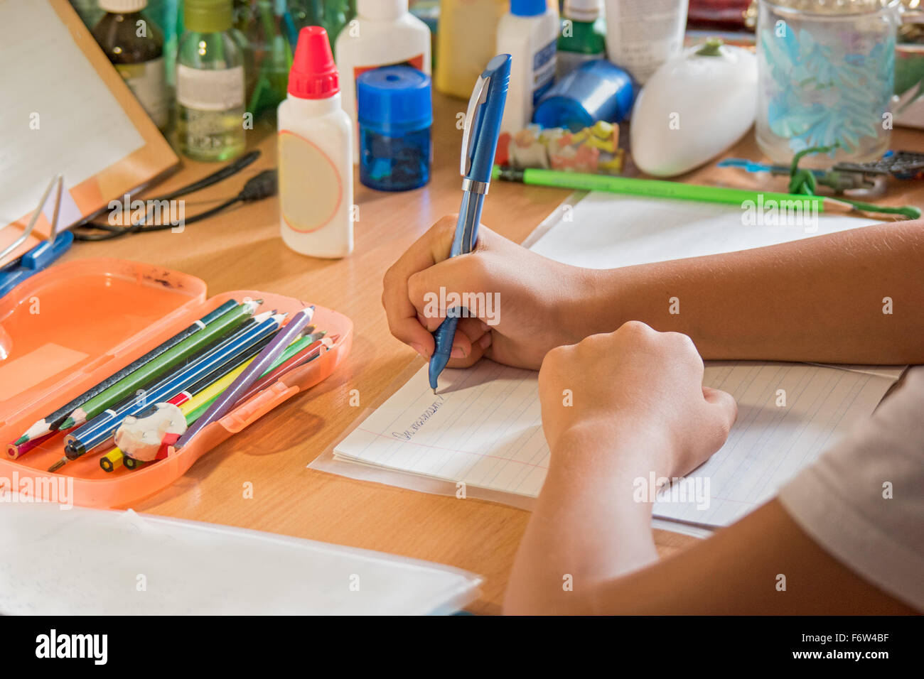Closeup of the writing school boy hands Stock Photo - Alamy