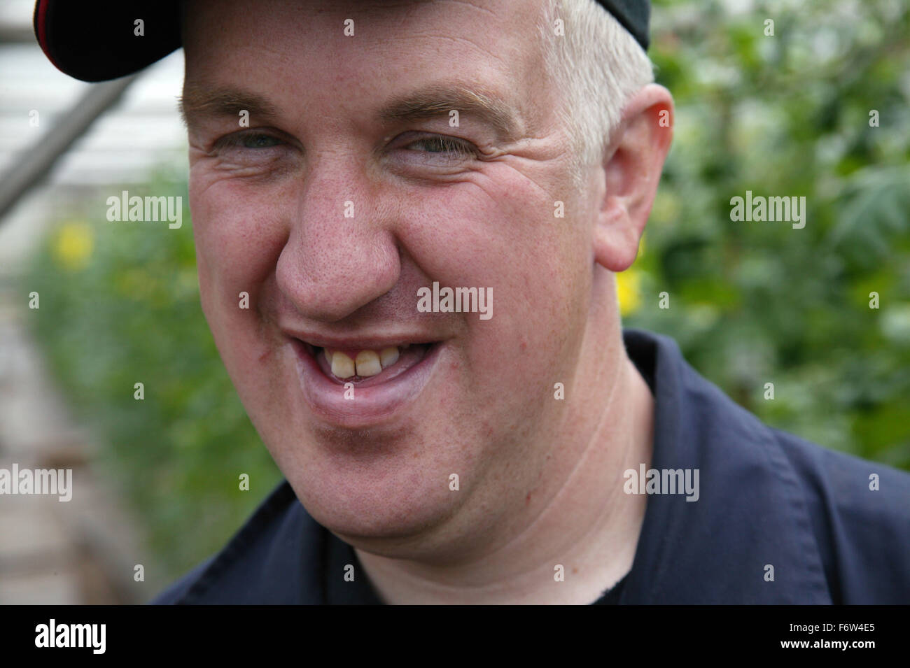 Portrait of man with learning disability smiling; at Brook Farm; Linby ...