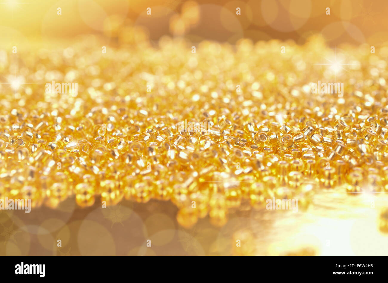Abstract Christmas background with golden pearls Stock Photo - Alamy