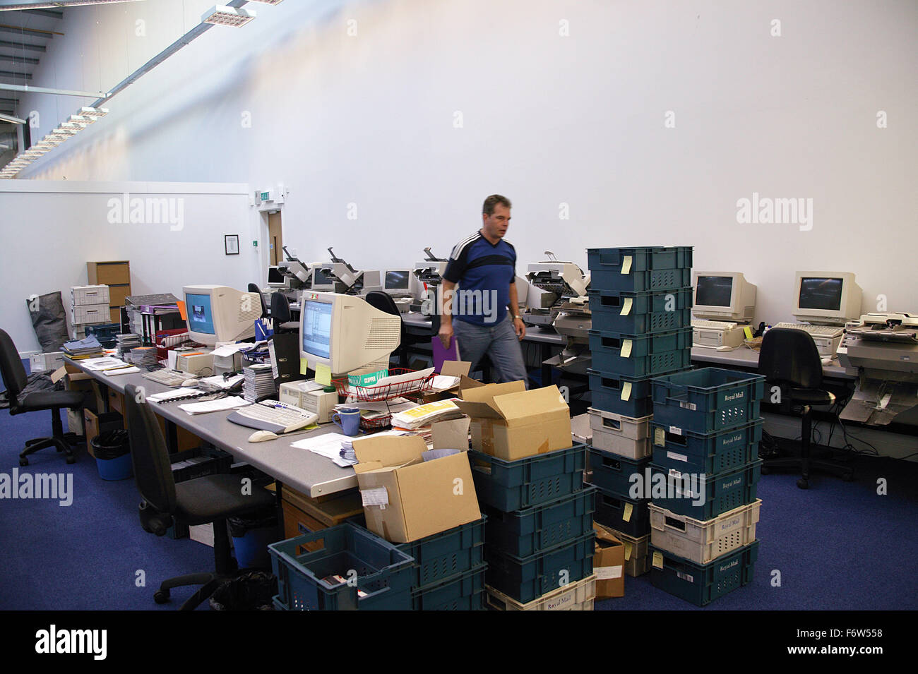 Man with epilepsy working as scanning operator in direct marketing ...