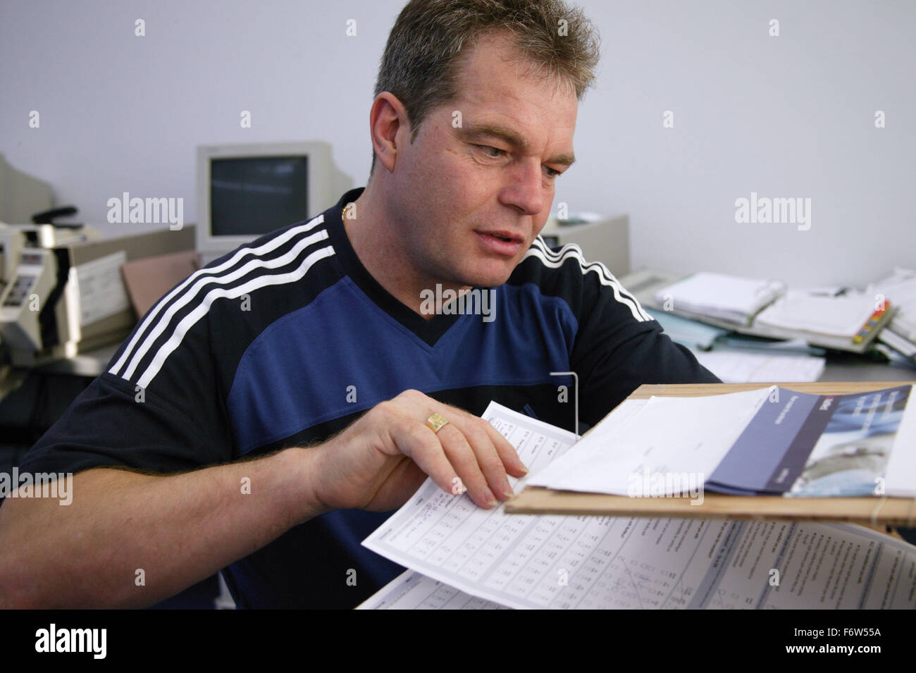 Man with epilepsy working as scanning operator in direct marketing ...