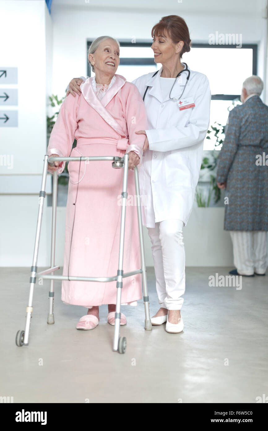 Elderly women walking frame hi-res stock photography and images - Alamy
