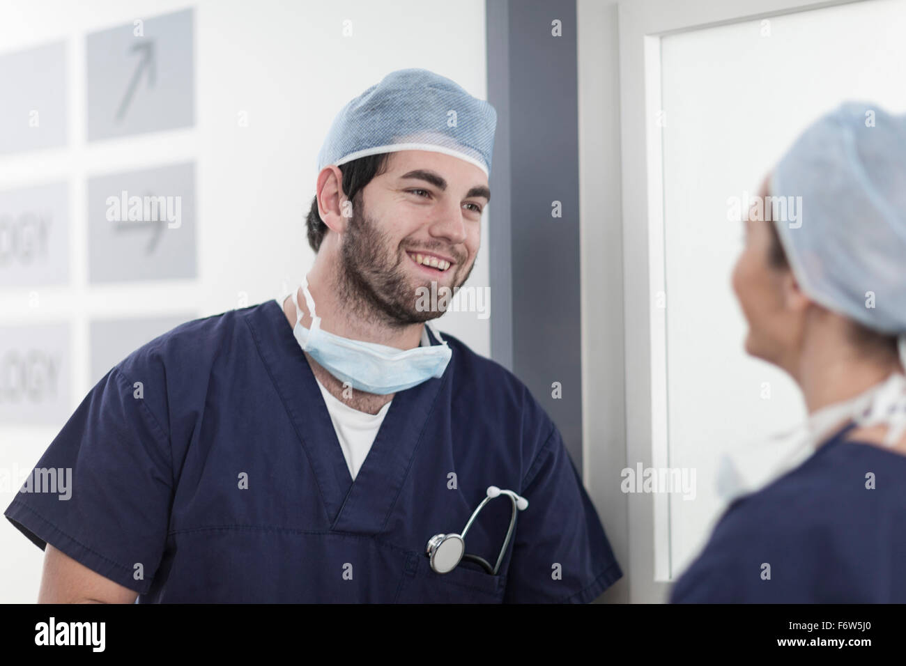 Doctors in hospital, communication Stock Photo - Alamy