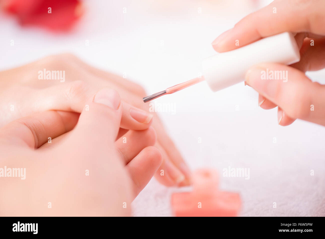 Professional manicurist making manicure Stock Photo - Alamy