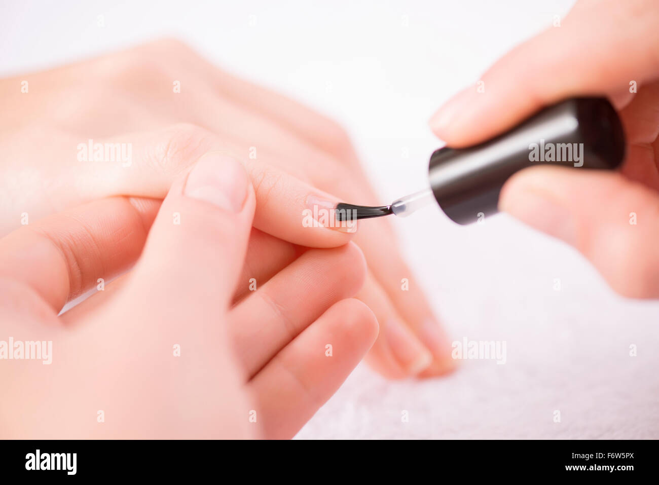 Professional manicurist making manicure Stock Photo - Alamy