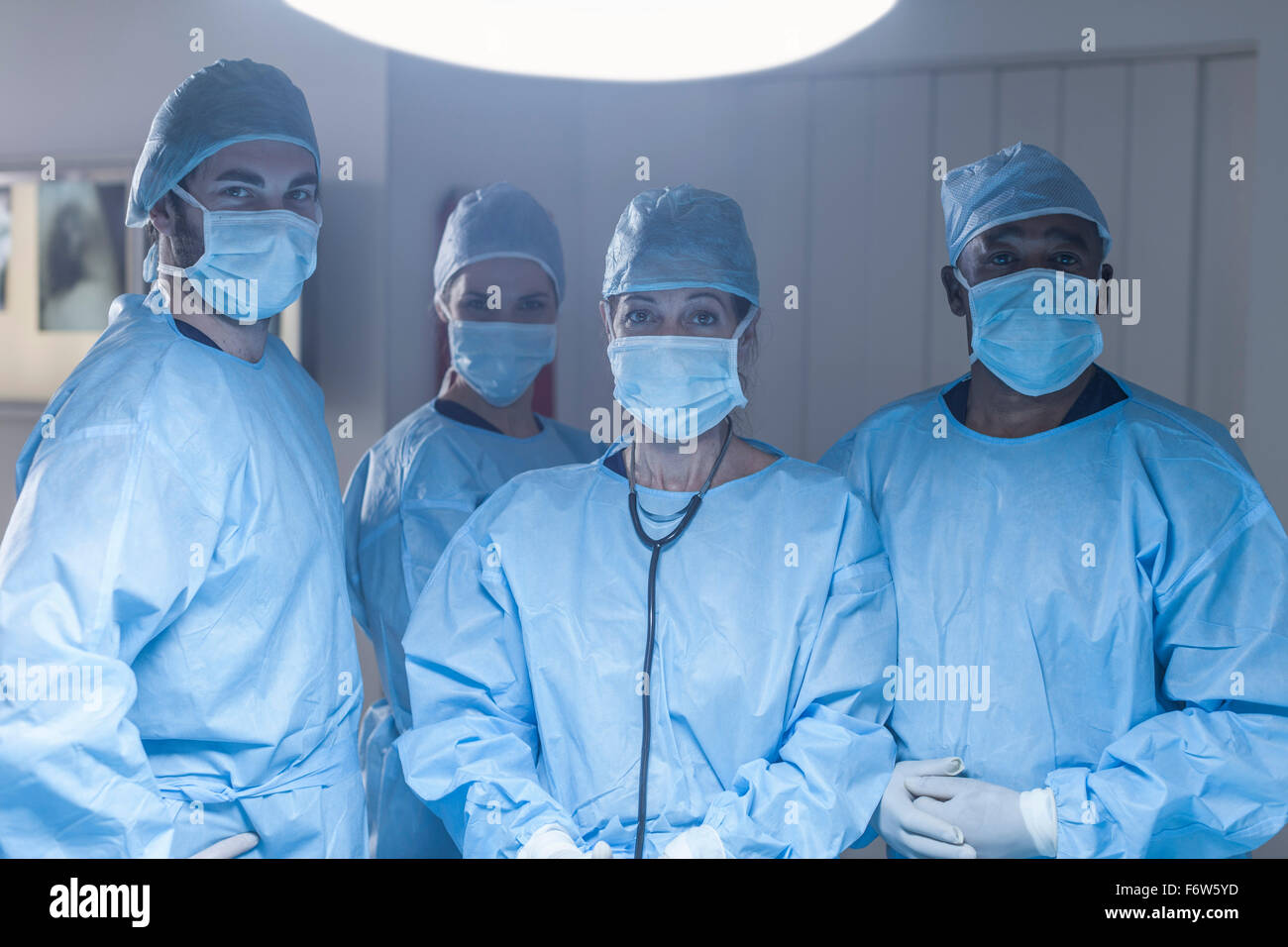 Portrait of surgical team wearing masks Stock Photo - Alamy