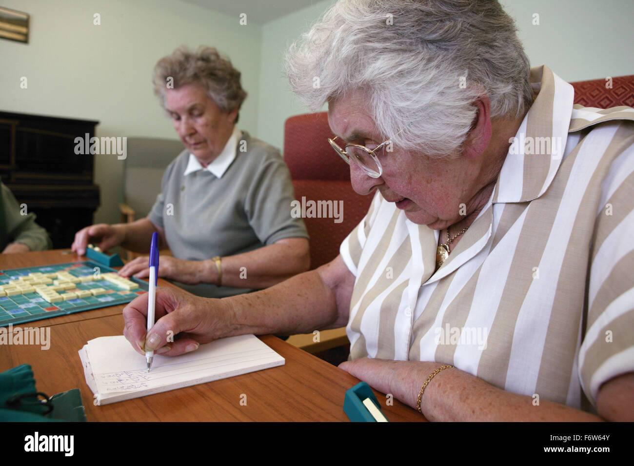 Elderly scrabble hi-res stock photography and images - Alamy