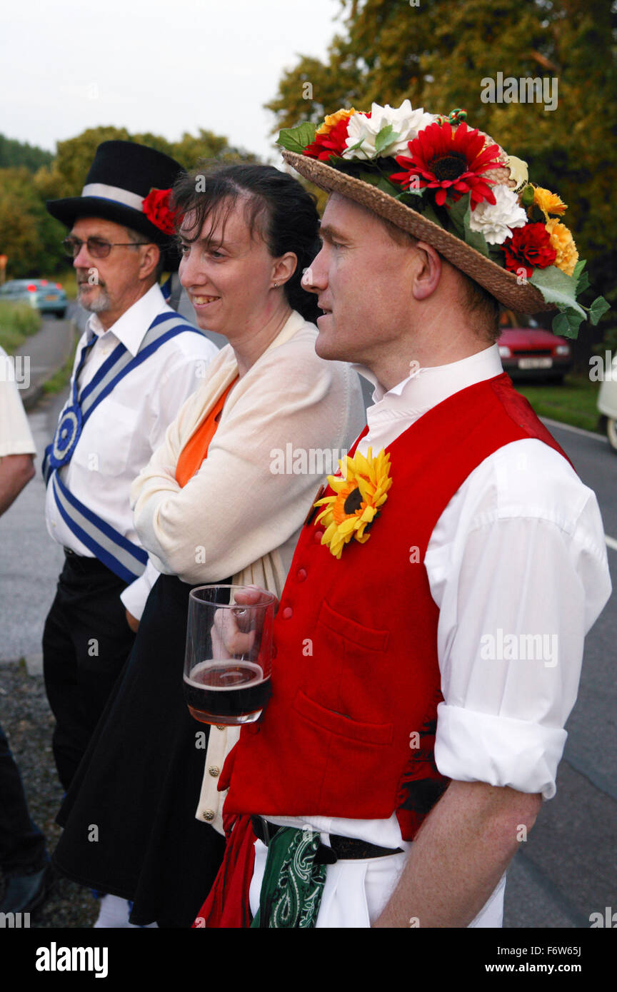 Morris dancers wearing costumes standing outdoors talking Stock Photo ...