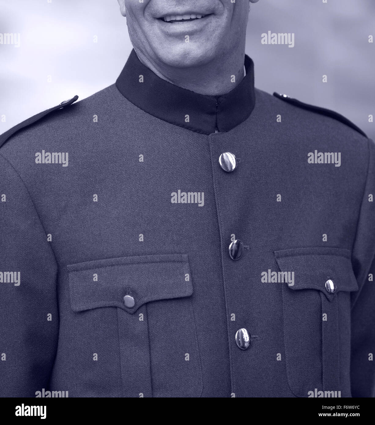 Bellhoper uniform black and white vertical image Stock Photo - Alamy