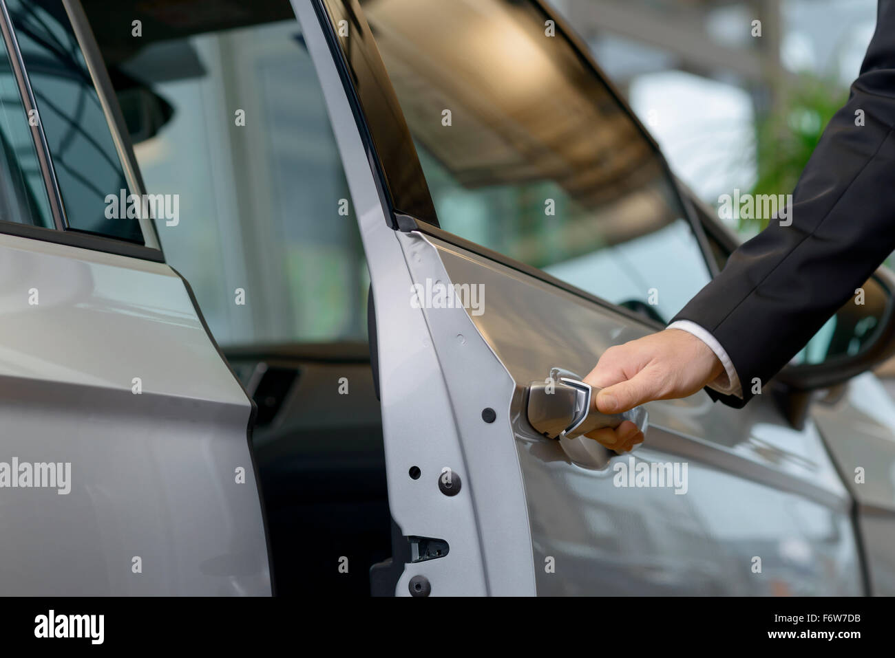 Car door is about to be opened Stock Photo - Alamy