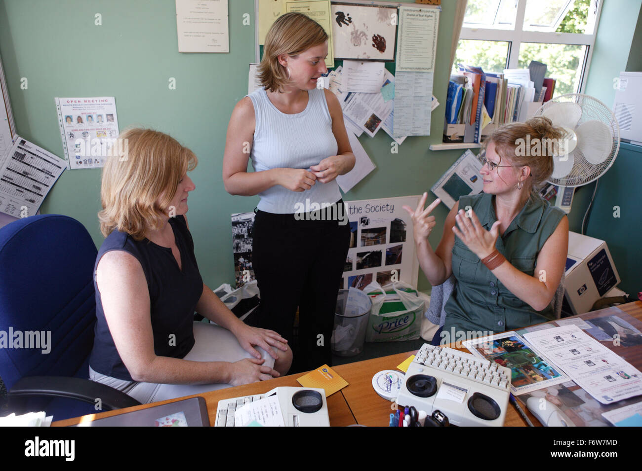 Women using sign language Stock Photo - Alamy