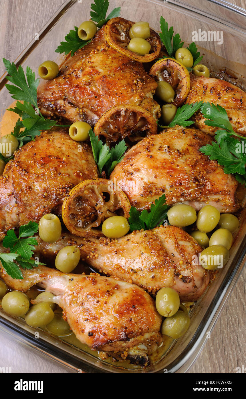 parts of chicken baked with olives marinated in lemon Stock Photo - Alamy