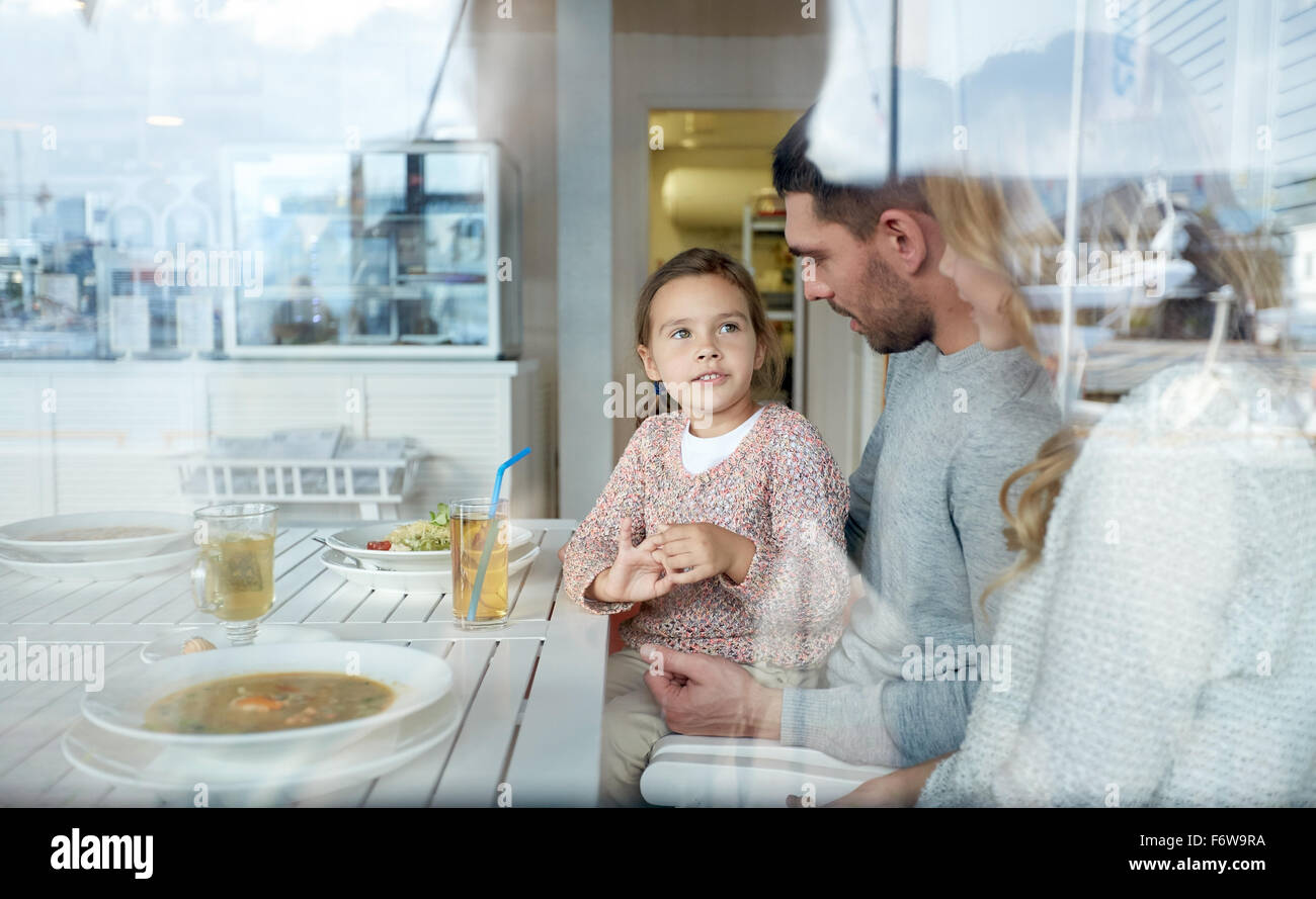 happy family having dinner at restaurant or cafe Stock Photo - Alamy