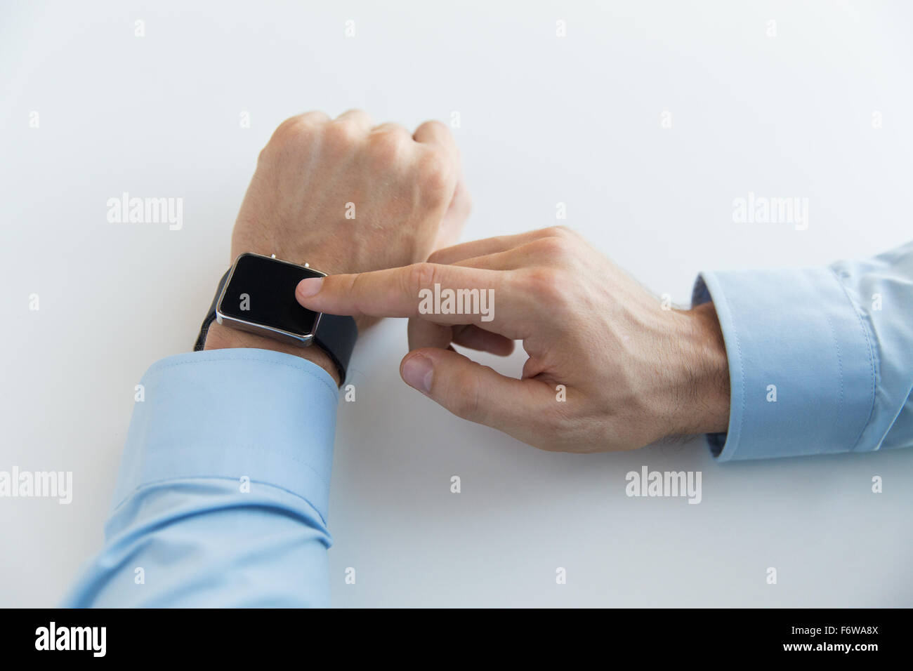 close up of male hands setting smart watch Stock Photo - Alamy