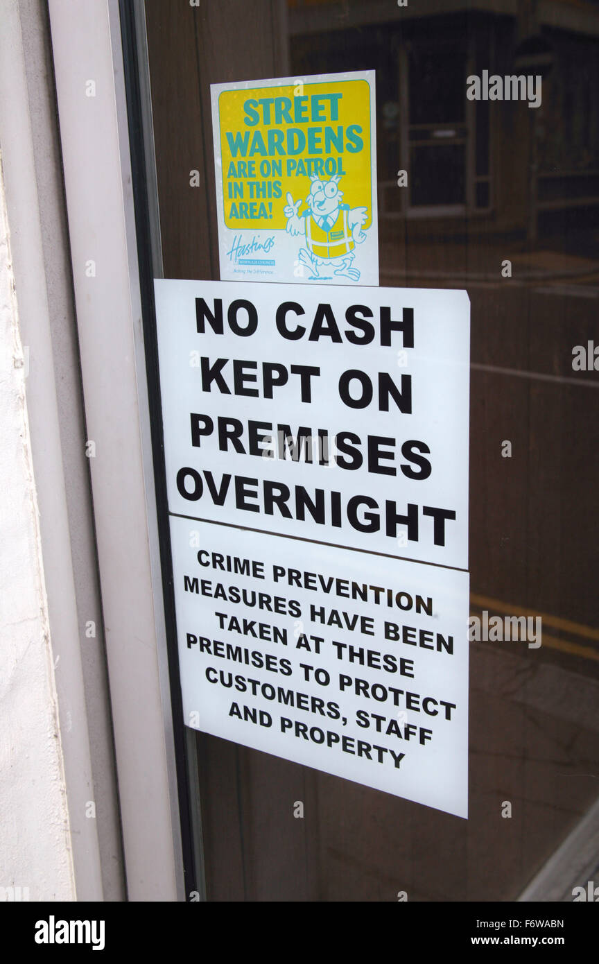 Crime prevention poster on a door in Hastings Stock Photo - Alamy