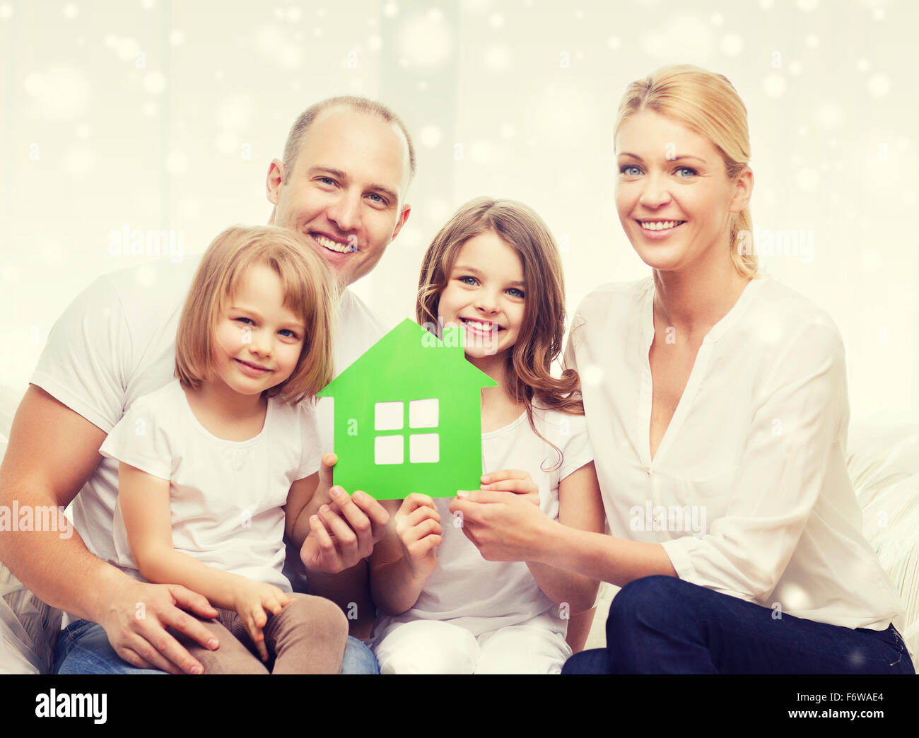 happy family with two kids and paper house at home Stock Photo - Alamy