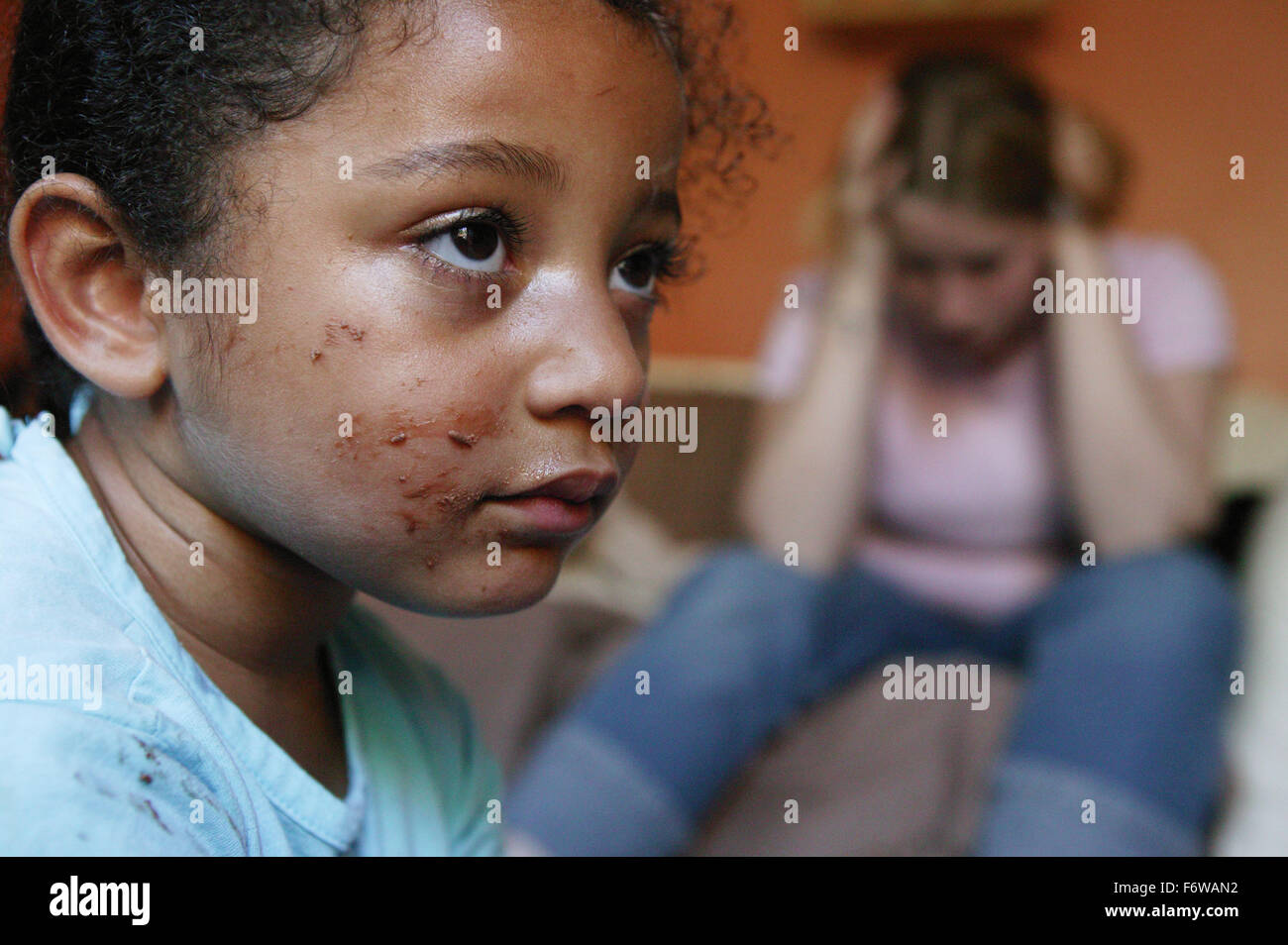 Drug addict mother in charge of child Stock Photo - Alamy