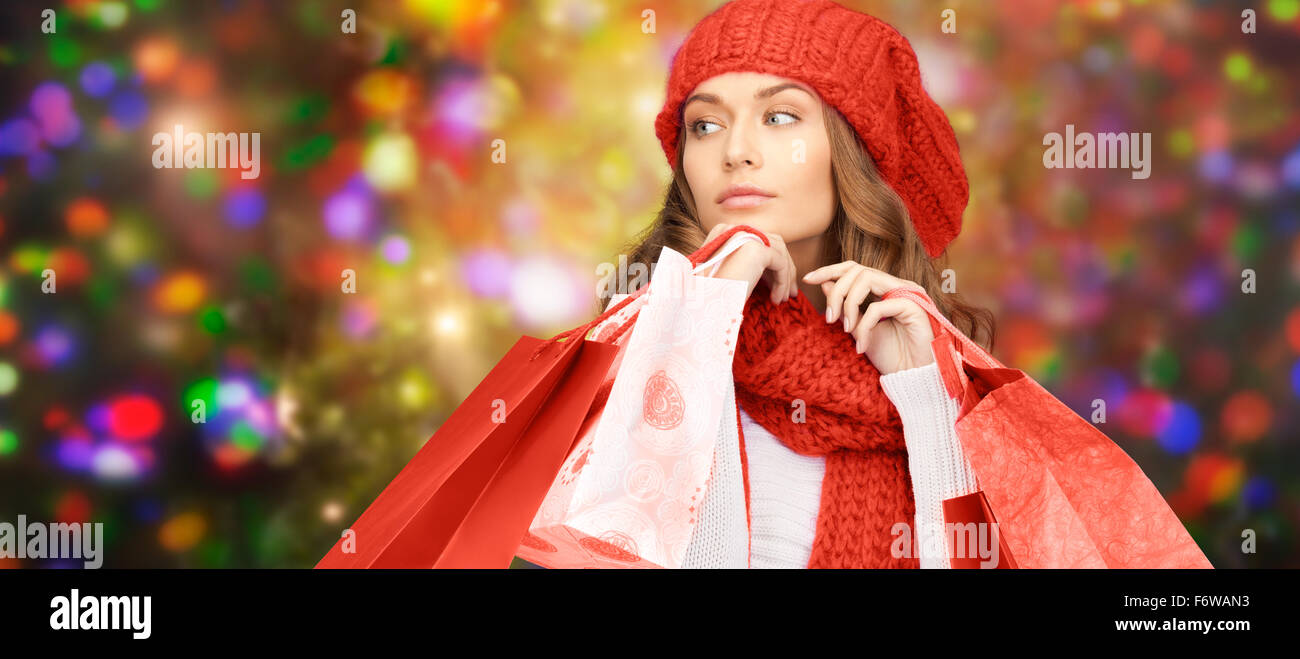 woman in winter clothes with shopping bags Stock Photo - Alamy