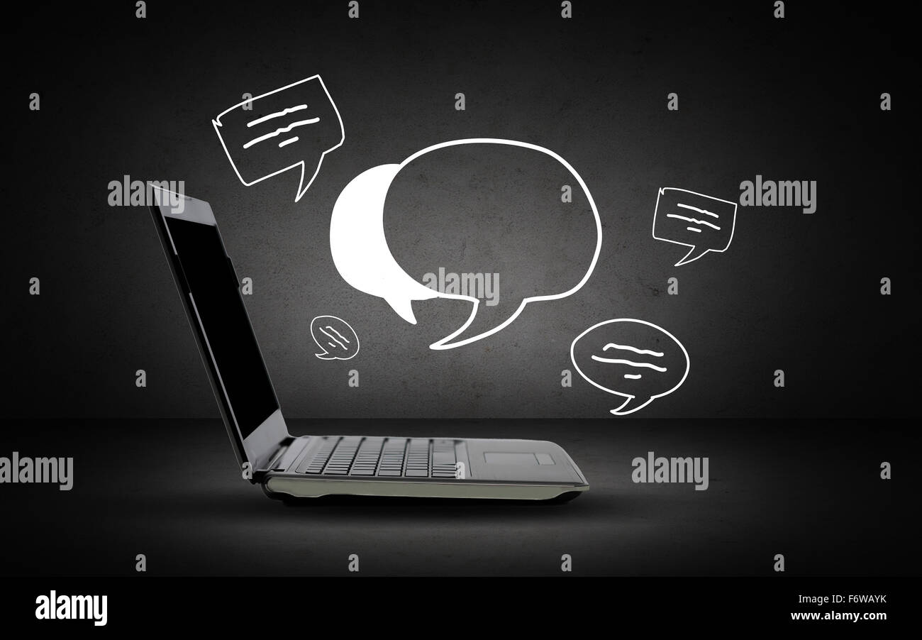 laptop computer with blank screen and text bubbles Stock Photo - Alamy