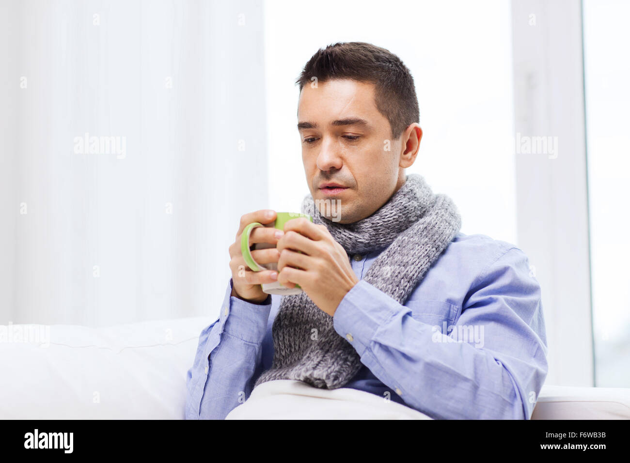 Man ill flu home hi-res stock photography and images - Alamy