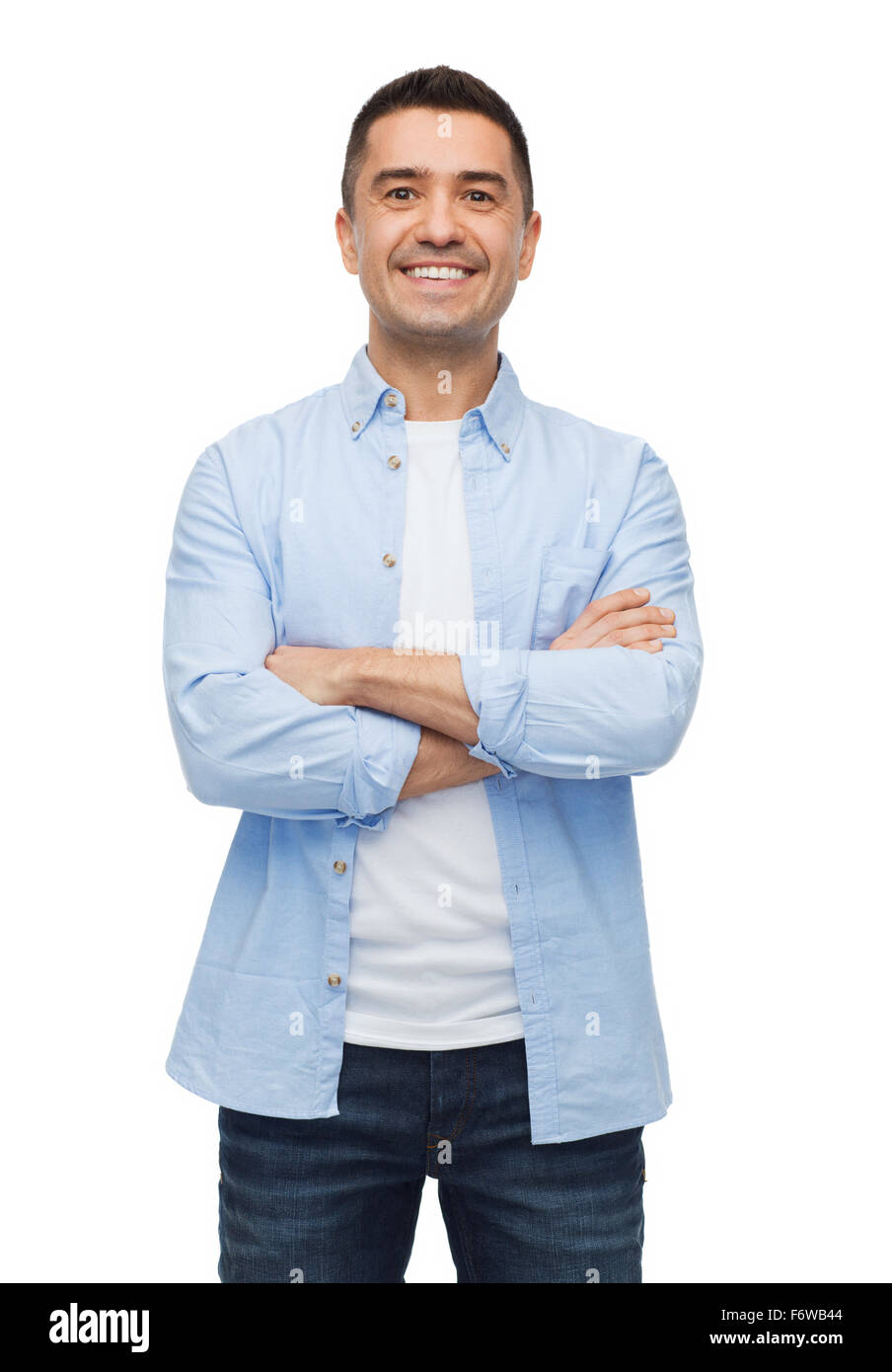 smiling man with crossed arms Stock Photo - Alamy