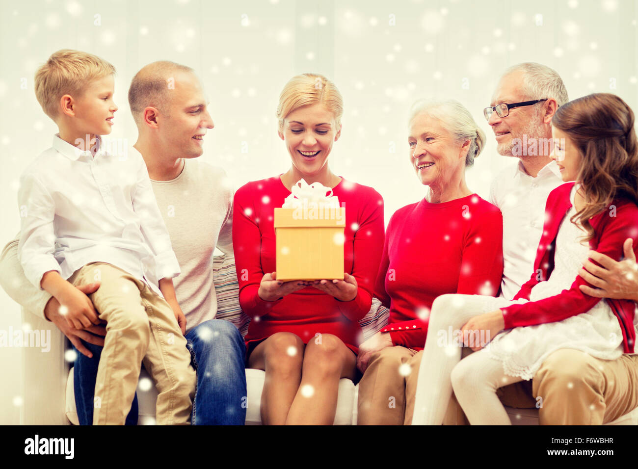 smiling family with gifts at home Stock Photo - Alamy