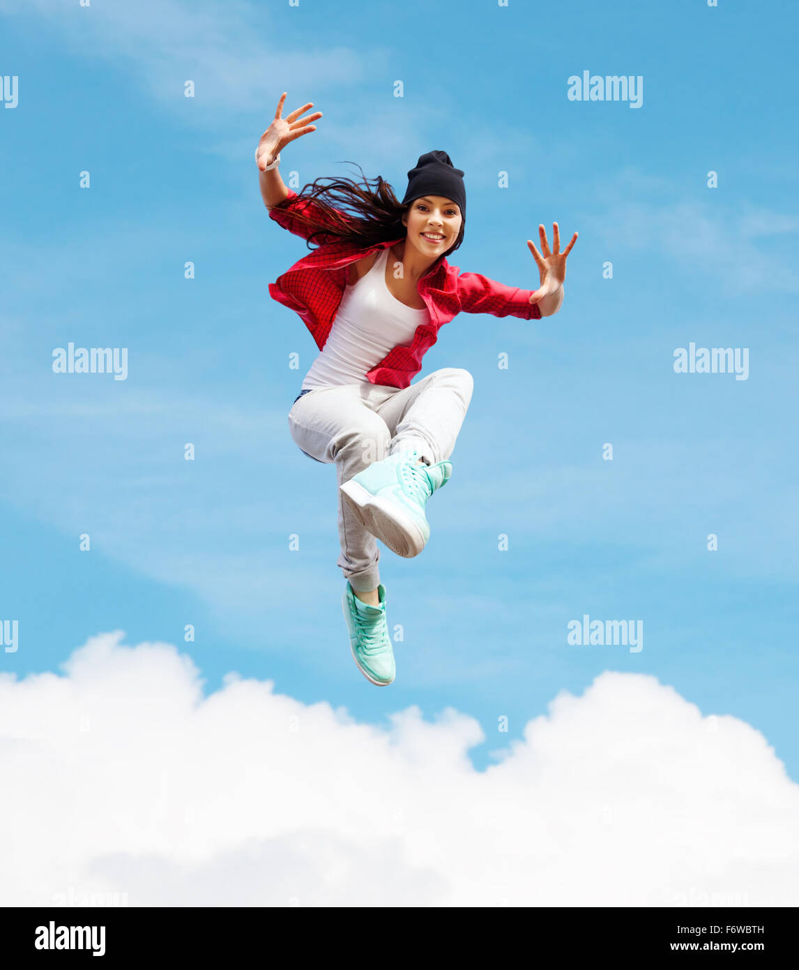 beautiful dancing girl jumping Stock Photo - Alamy