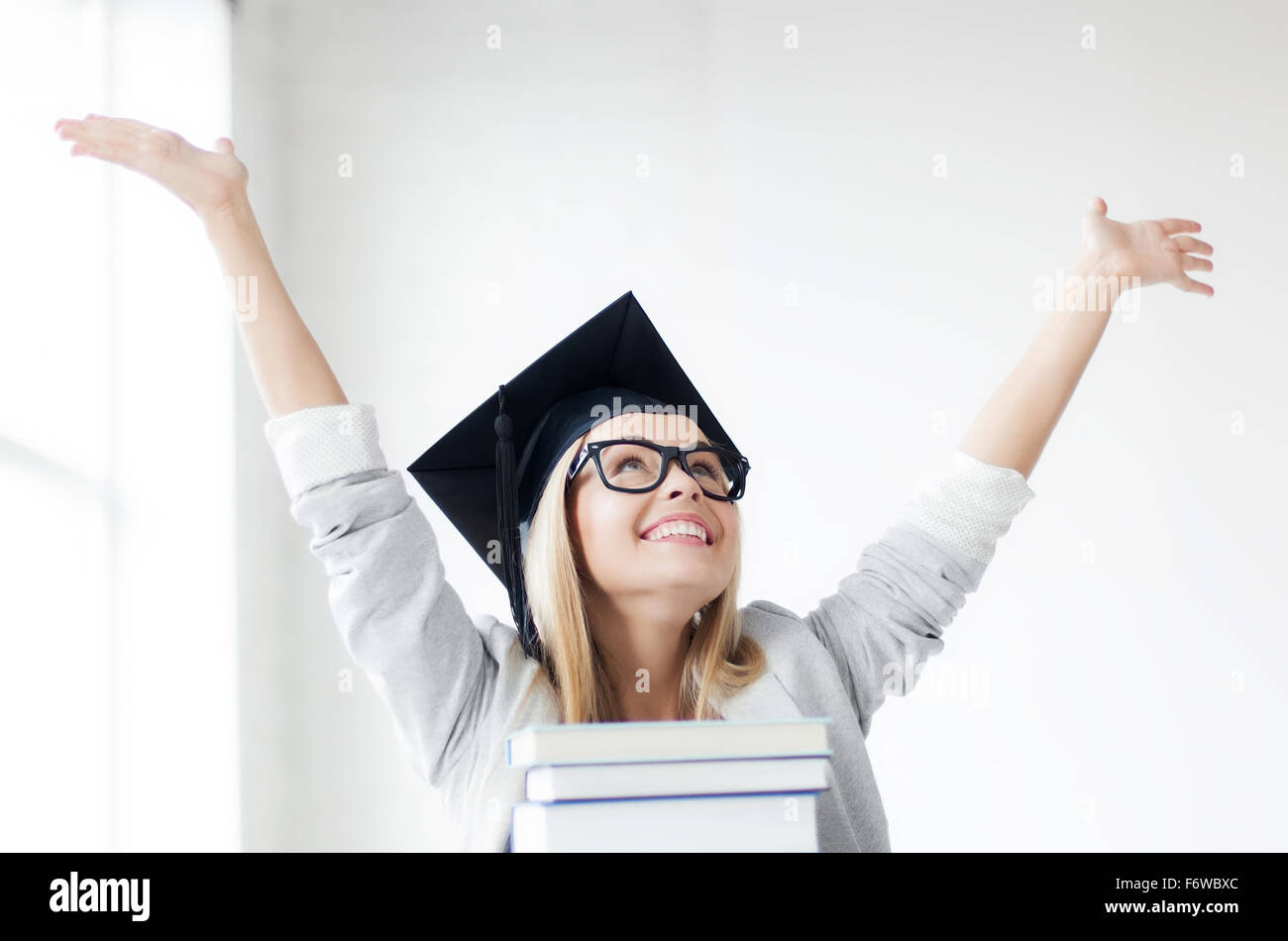 happy student in graduation cap Stock Photo - Alamy