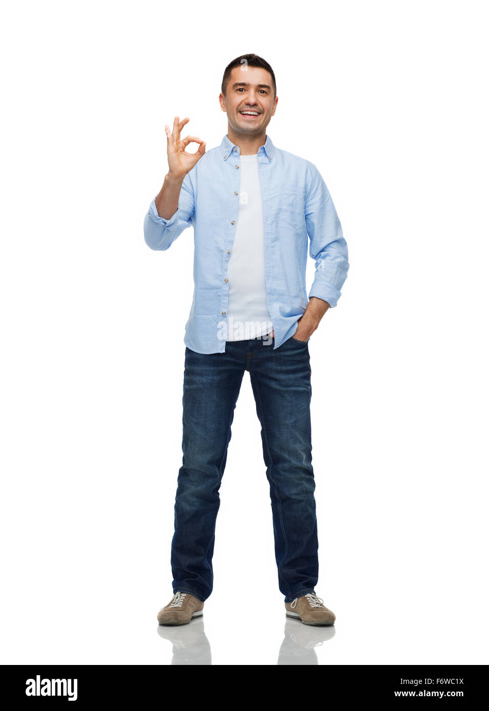 smiling man showing ok hand sign Stock Photo - Alamy